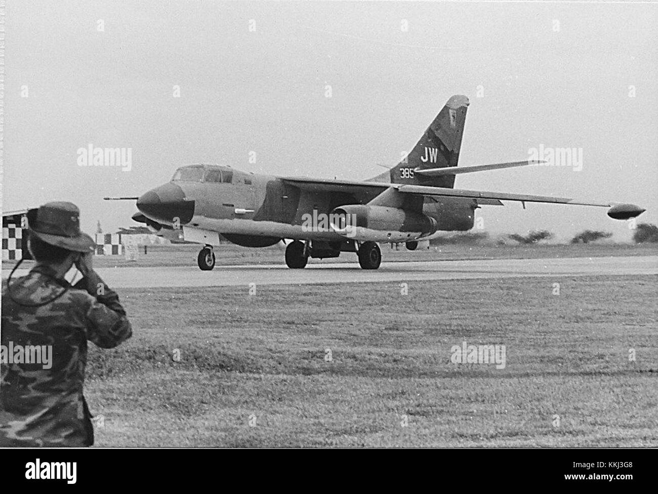 This photograph captures an EB-66 aircraft taking off from Korat Royal ...