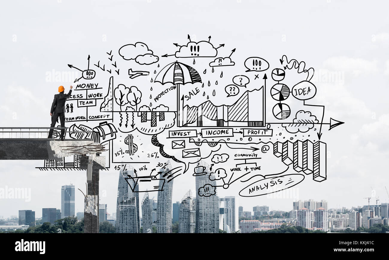 Businessman drawing business conceptual sketches Stock Photo - Alamy