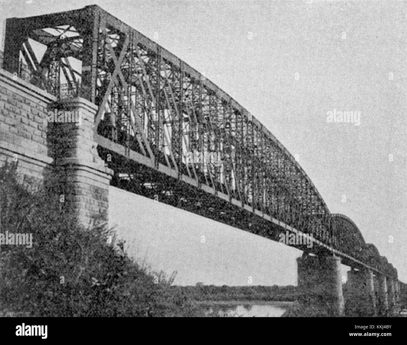 A photograph capturing a bridge spanning the Belaya River, highlighting ...