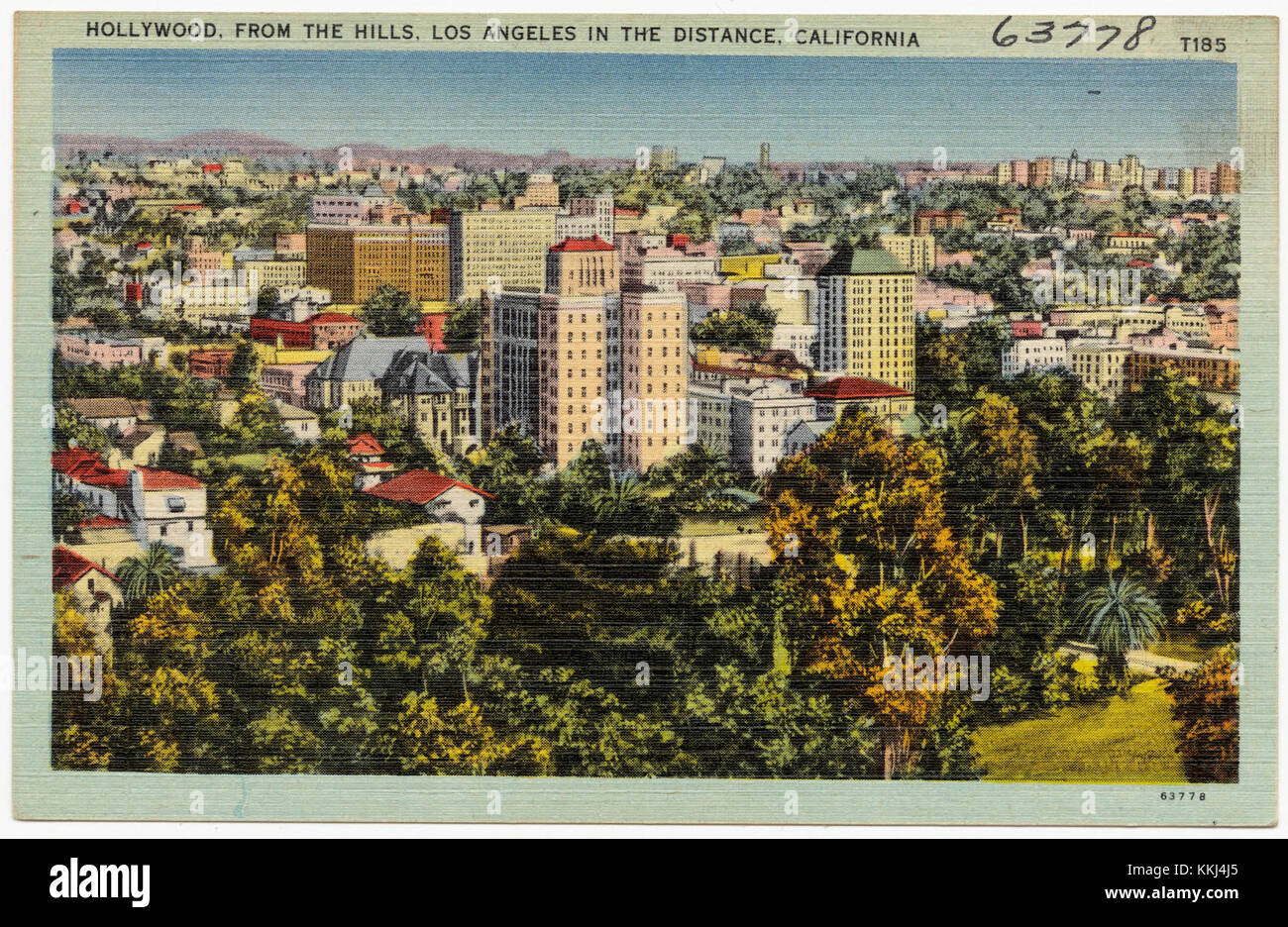 This photograph captures a panoramic view of Hollywood, with the iconic ...