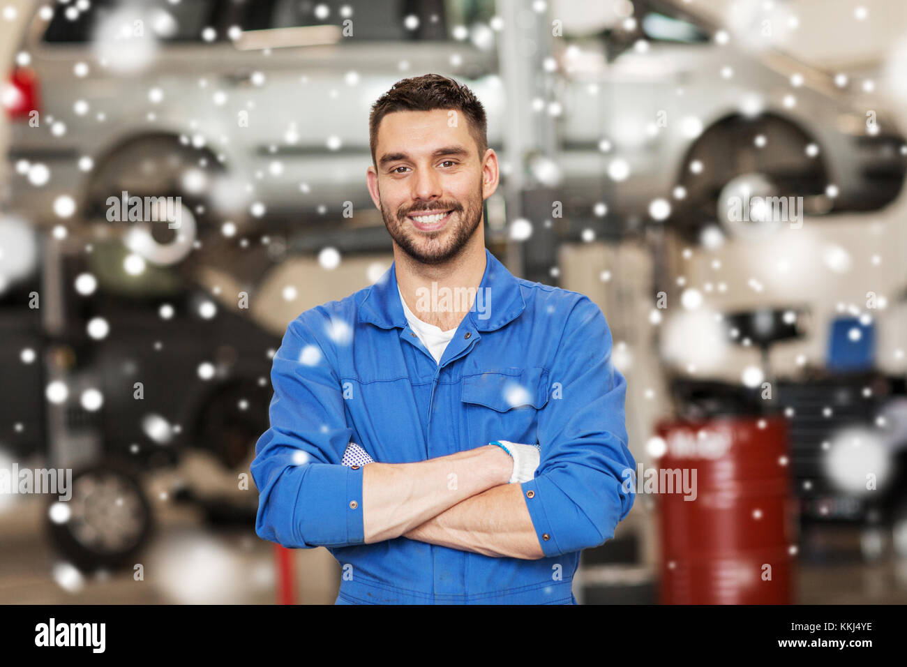 happy auto mechanic man or smith at car workshop Stock Photo - Alamy
