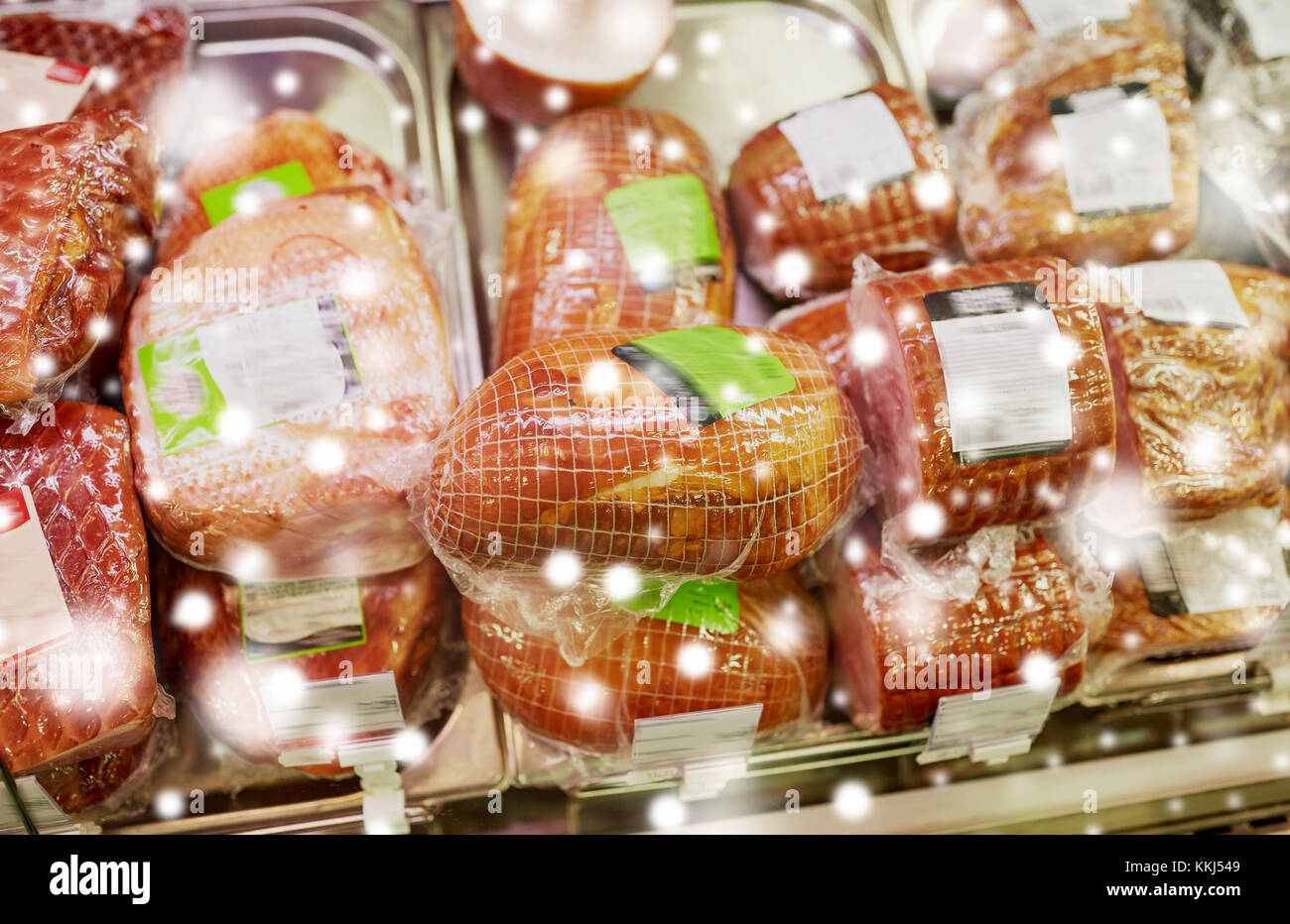 ham at grocery store stall Stock Photo - Alamy