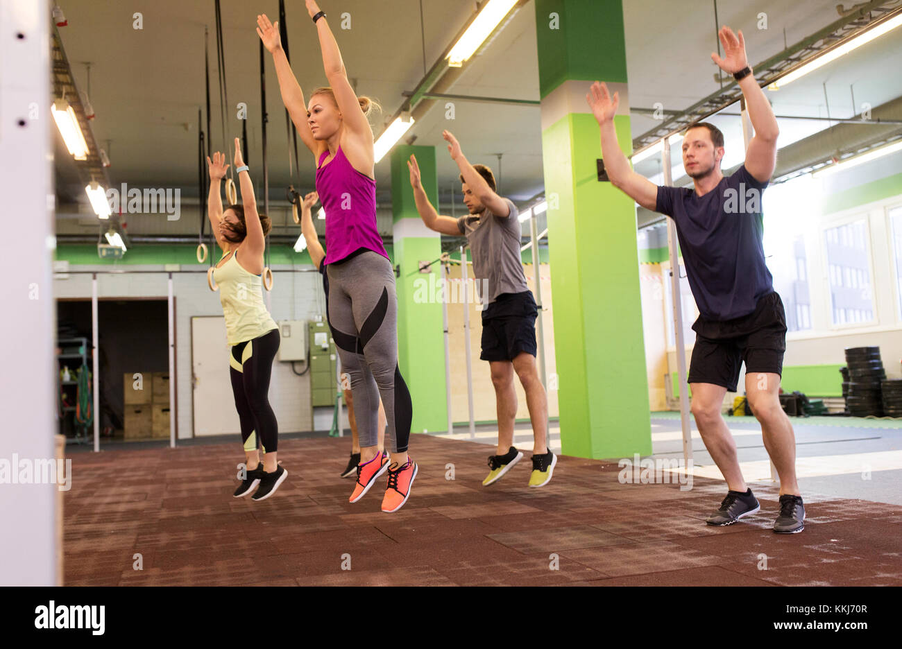 group of people exercising and jumping in gym Stock Photo - Alamy