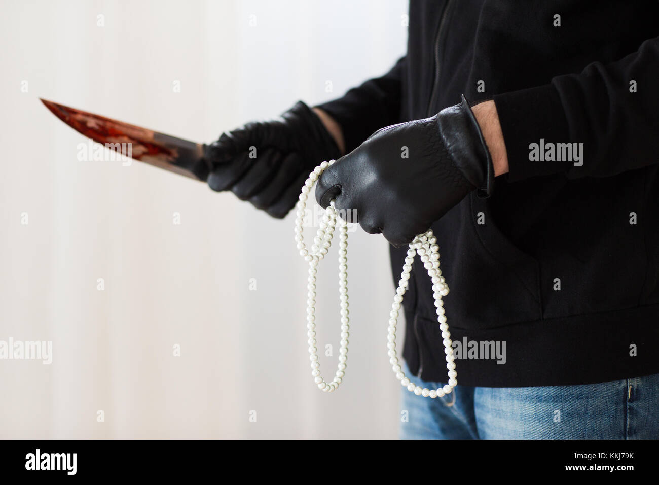 Young male thug criminal knife hi-res stock photography and images - Alamy