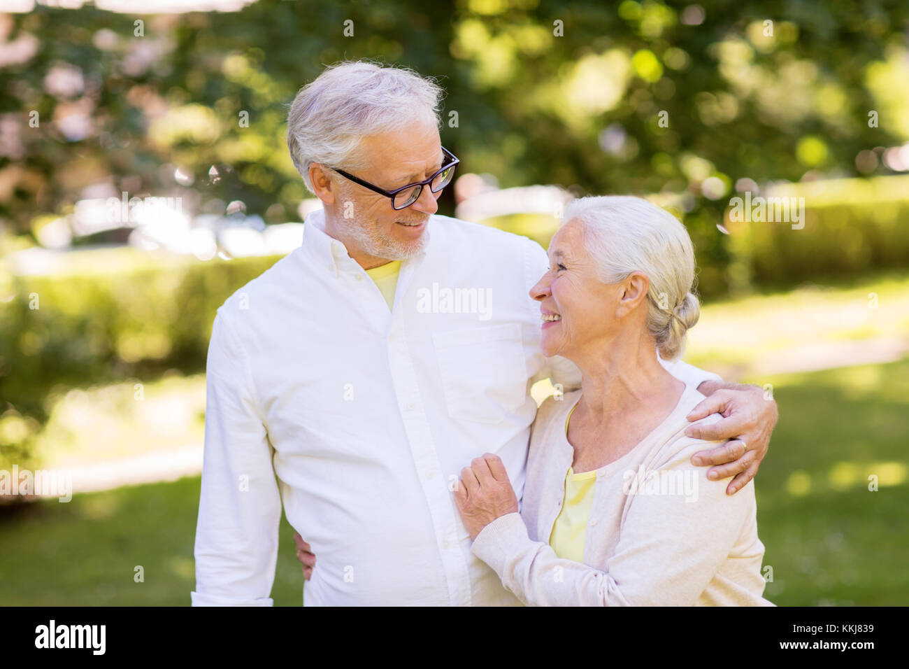 Smiling aged wife and husband hugging hi-res stock photography and ...