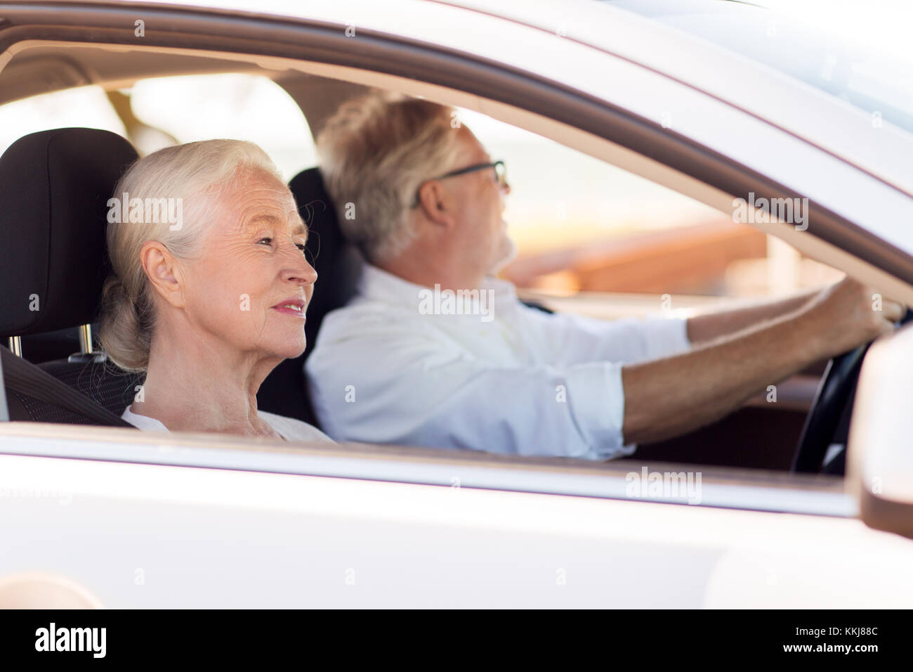 happy senior couple driving in car Stock Photo - Alamy