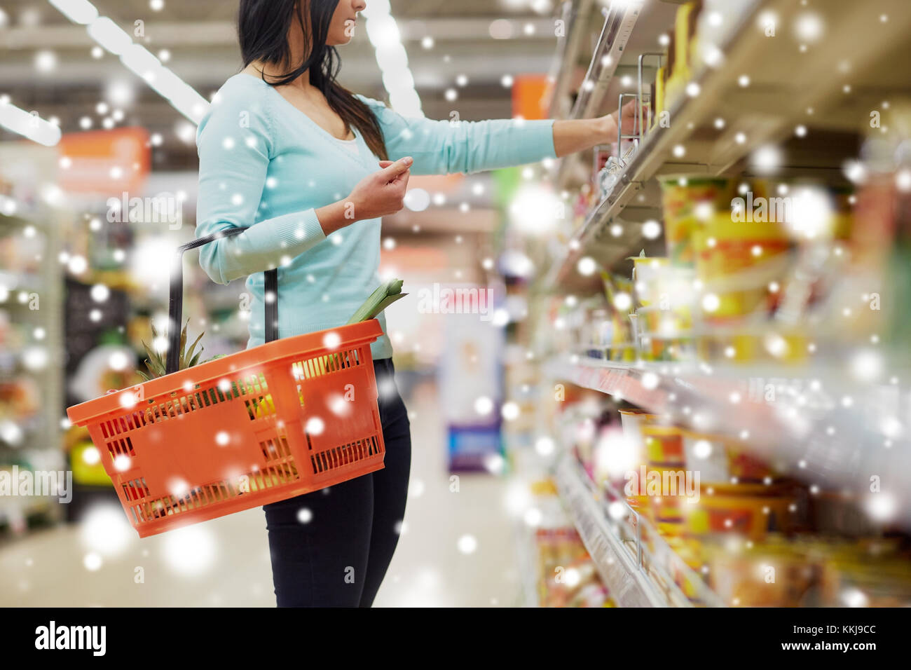customer with basket at grocery or supermarket Stock Photo - Alamy