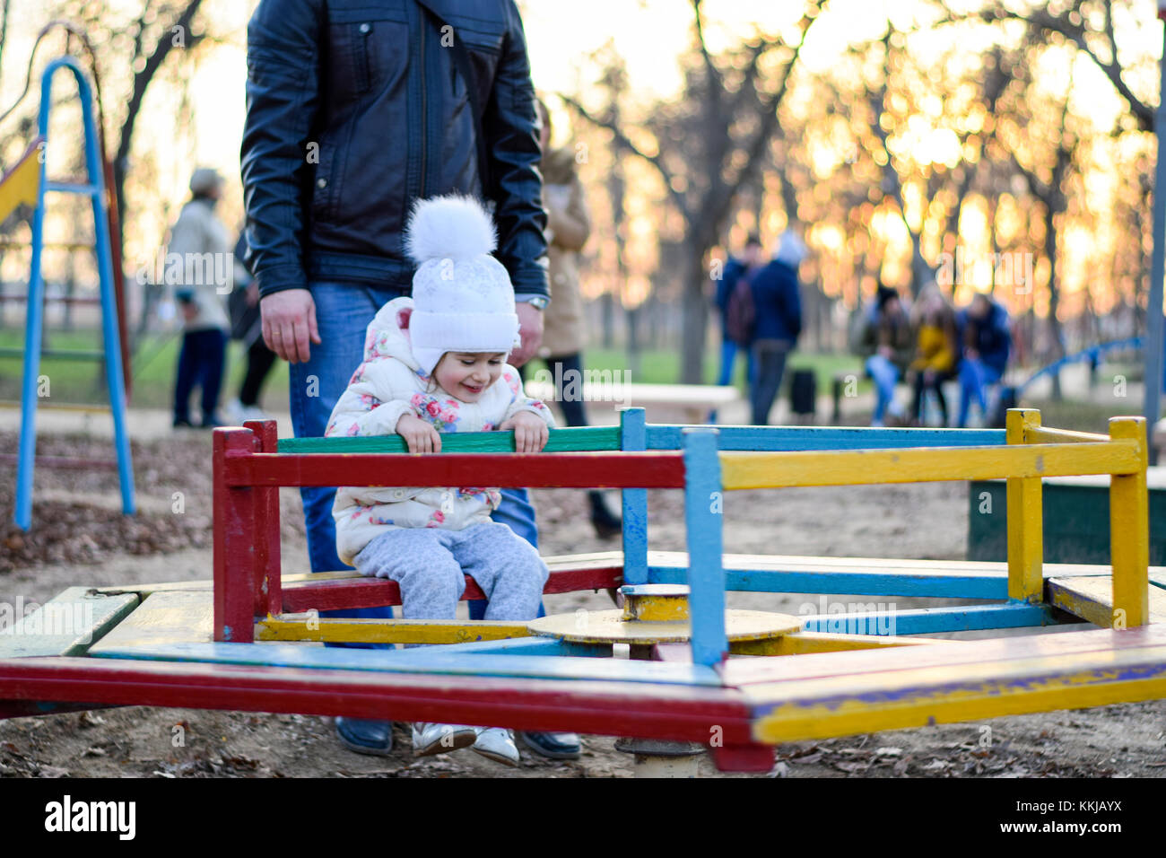 Dad plays with his daughter on the playground Stock Photo - Alamy