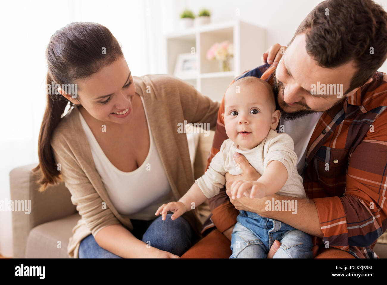 happy family with baby at home Stock Photo - Alamy