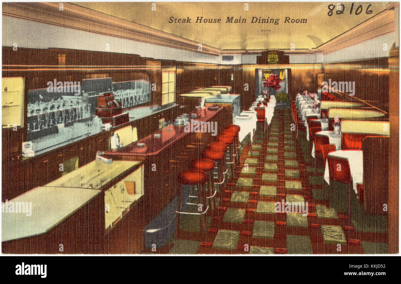 An interior view of a traditional steakhouse main dining room ...