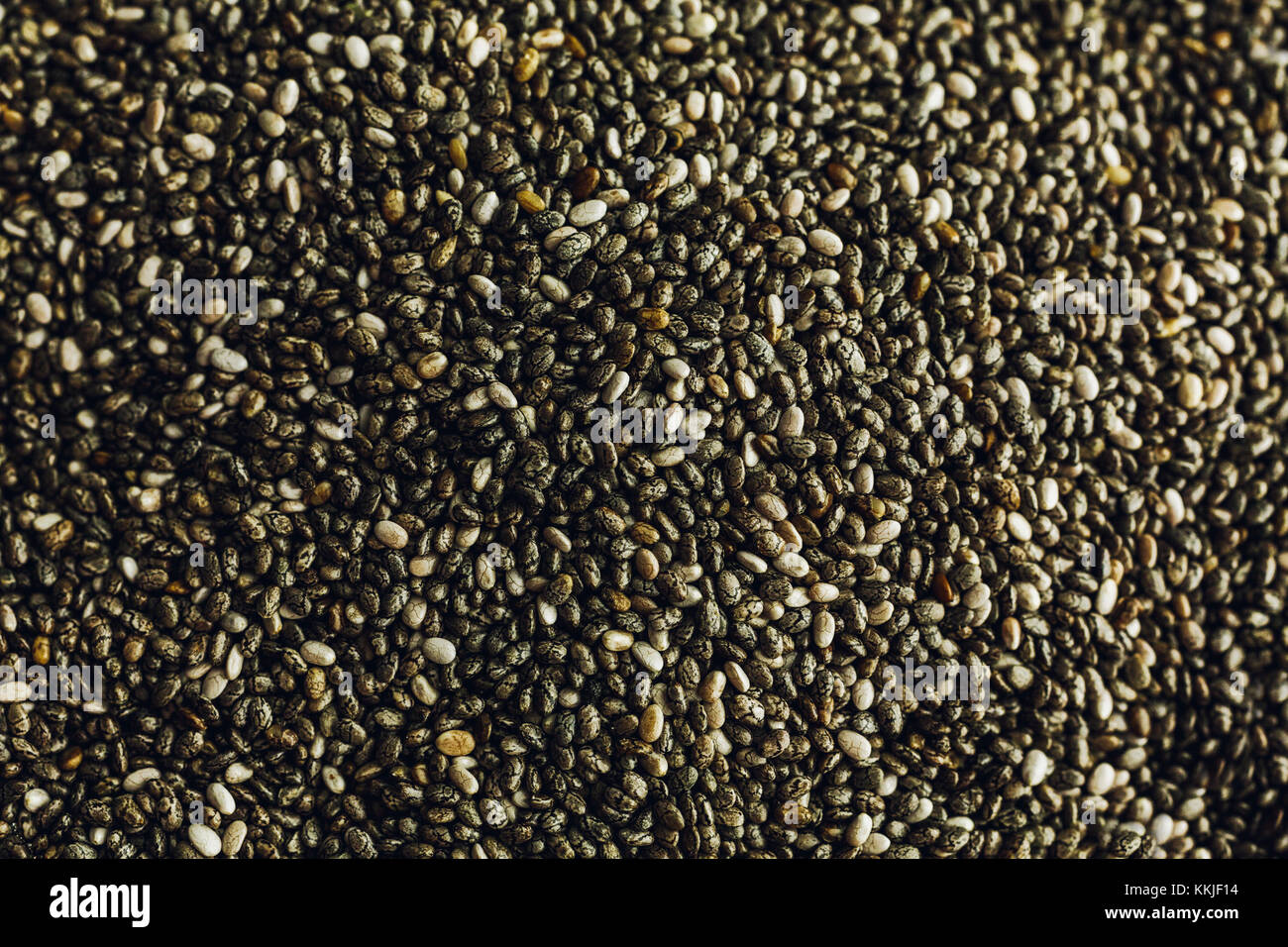Background of Super healthy chia seeds close-up Stock Photo - Alamy