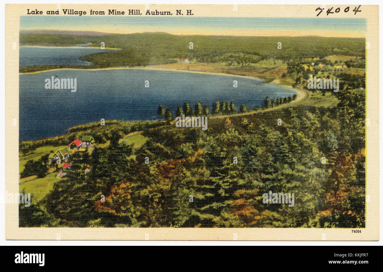 This photograph shows a scenic view of a lake and village from Mine ...