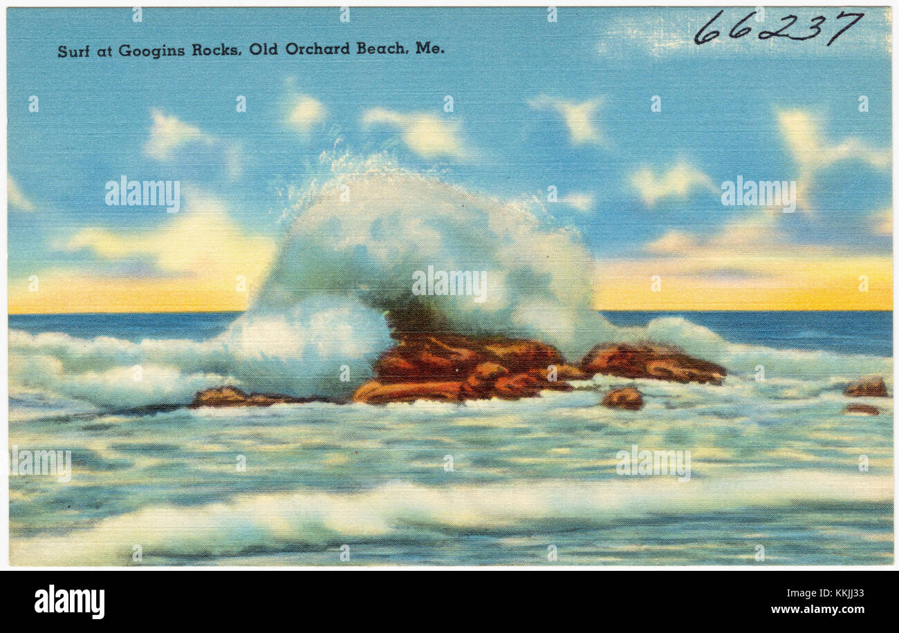 This image captures surfers riding waves at Googins Rocks, located in ...