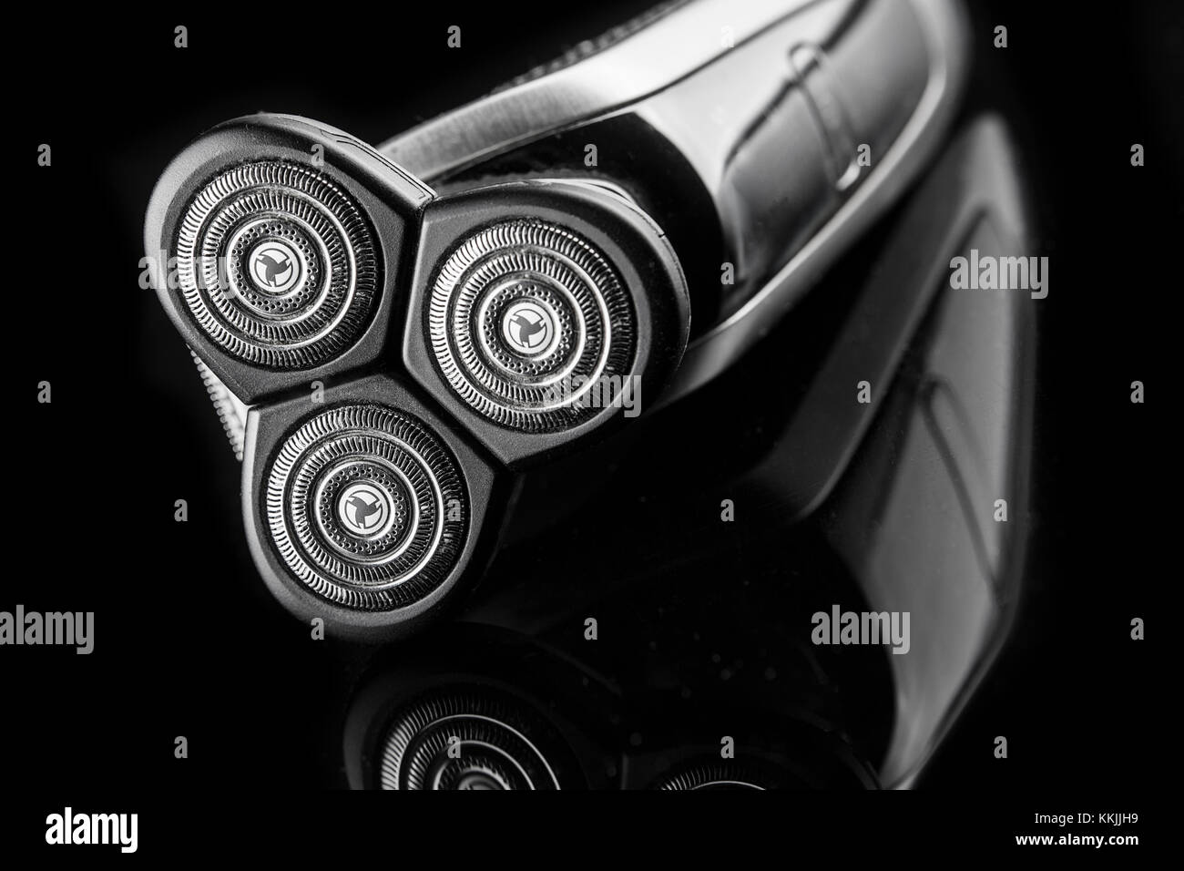Electric shaver close-up on a black background, copy space Stock Photo ...