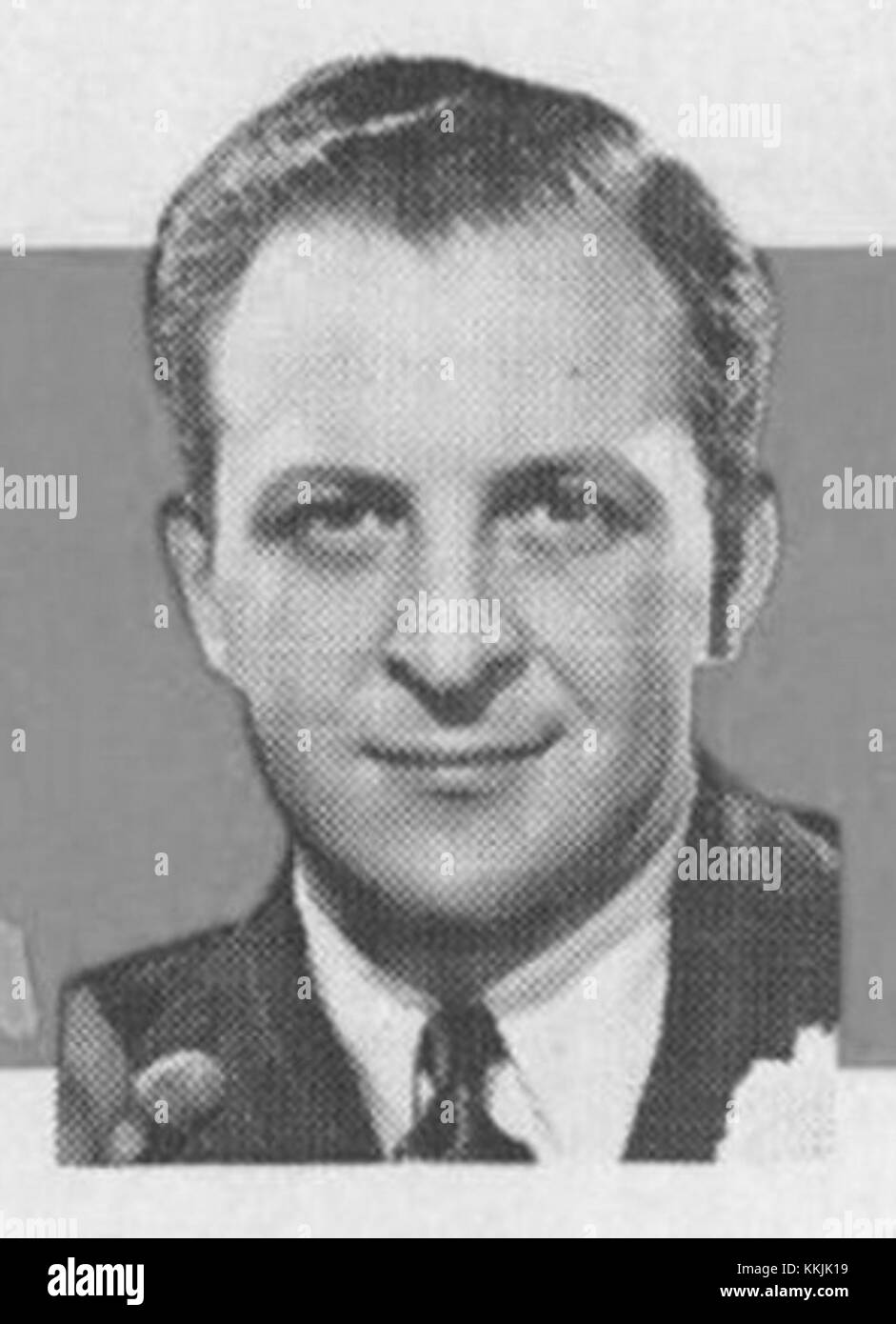 This image features a billboard advertisement for Barry Wood, an ...