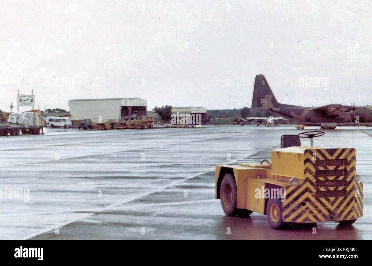 The image shows a C-130 aircraft parked on a ramp, commonly used by ...