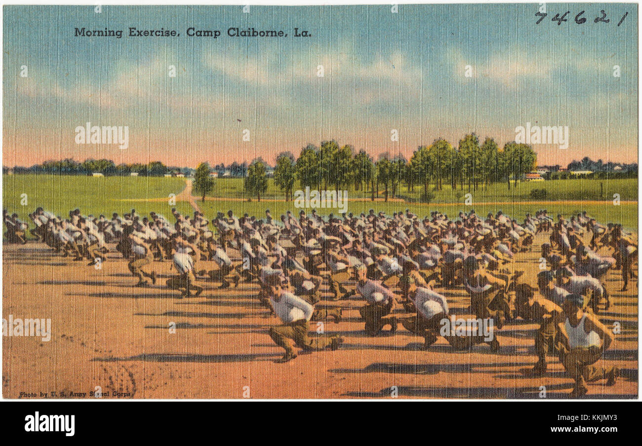 This photograph captures soldiers engaging in morning exercise at Camp ...