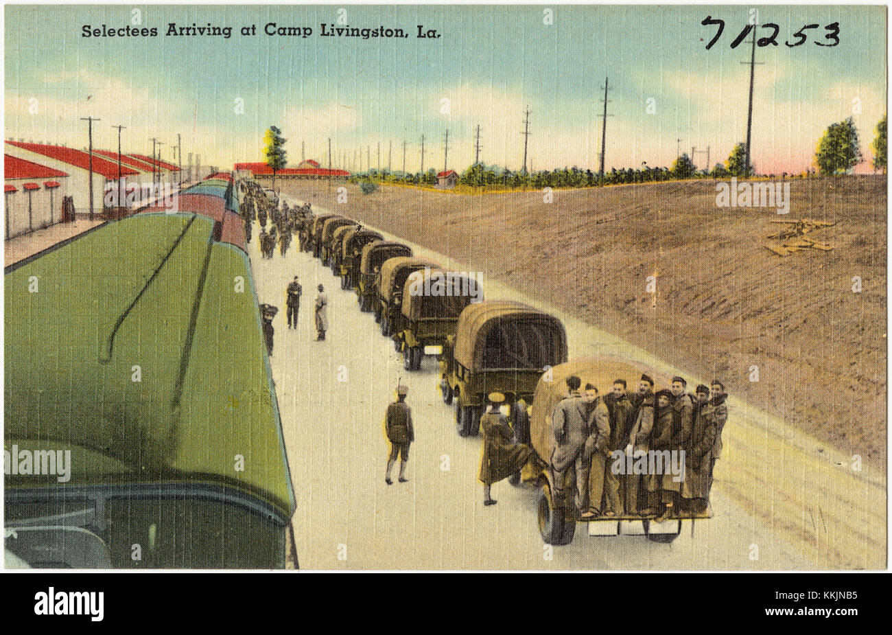 This historical photograph shows selectees arriving at Camp Livingston ...