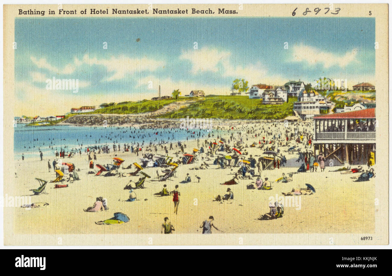 The image shows people bathing in the waters of Nantasket Beach in ...
