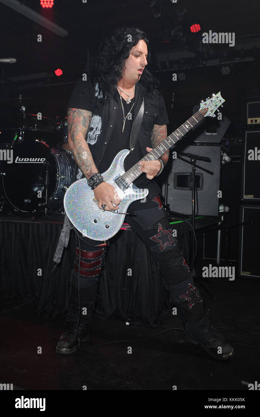 MIAMI, FL - MARCH 05: Alex Grossi of Quite Riot performs during the ...