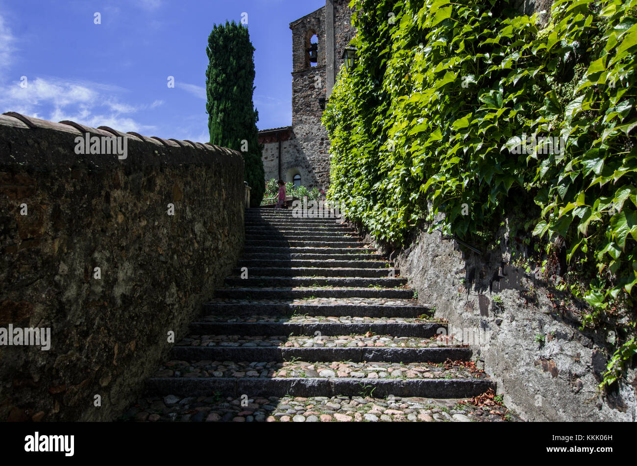 ancient medieval staircase leads to a Romanesque basilica Stock Photo ...
