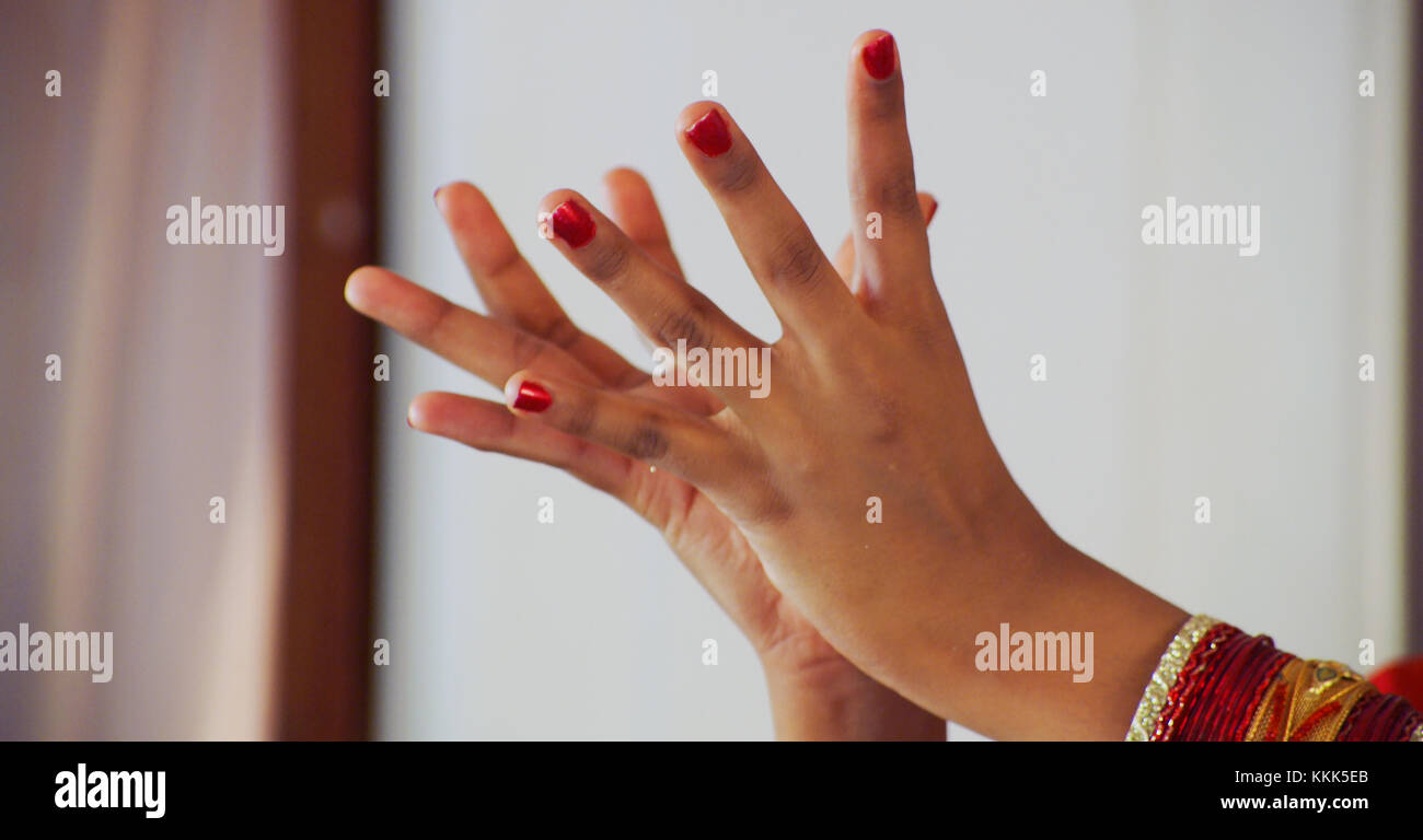 Close-up of a woman's hand, Indian girl dancer in the posture of Indian ...
