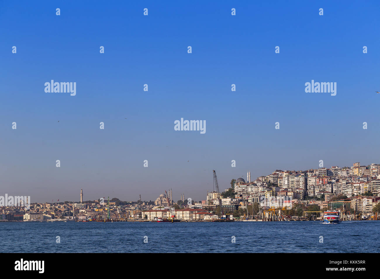 colorful life cityscape with construction in Bosphorus Strait Istanbul ...