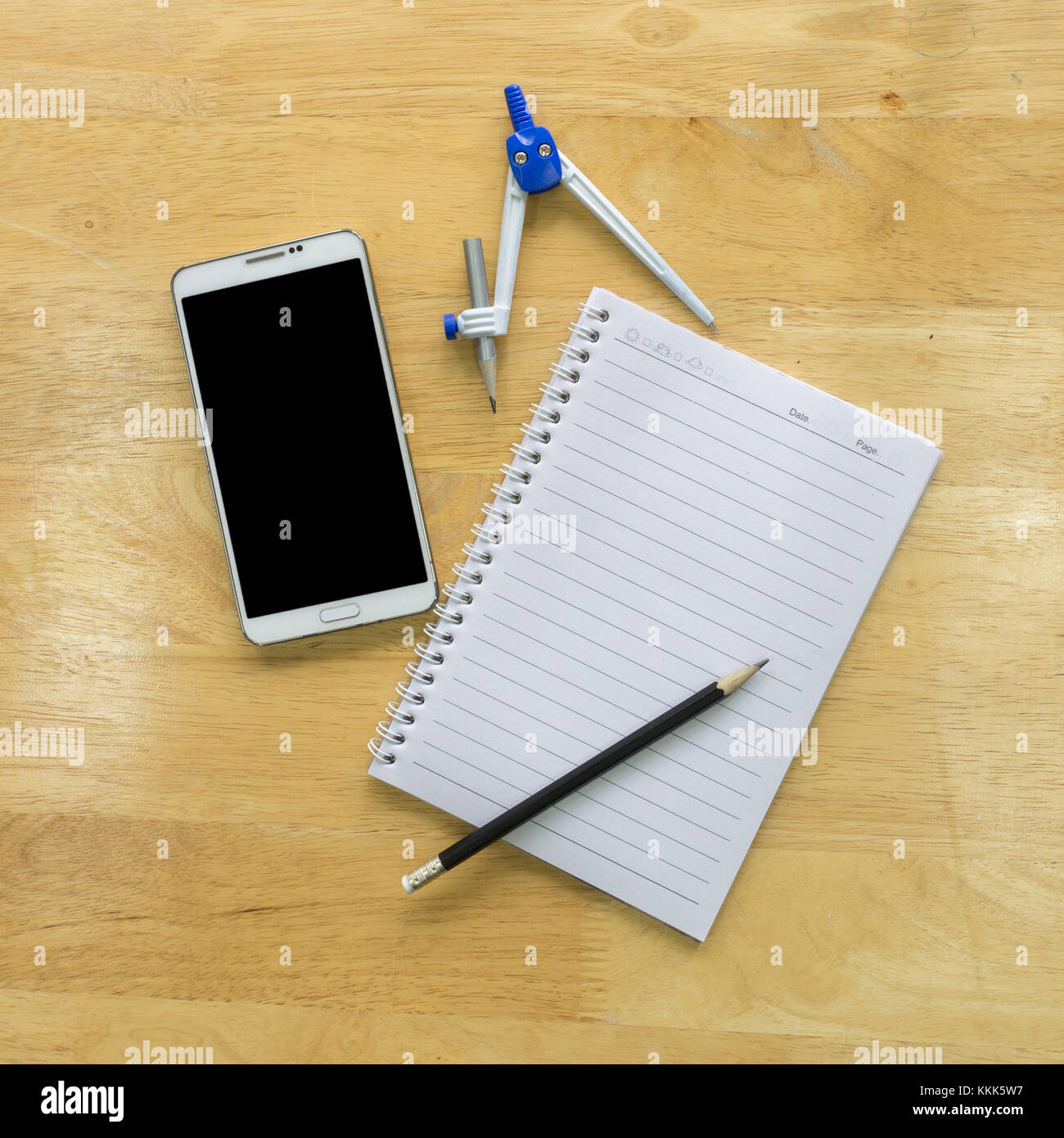 Notebook With Black Pencil On Wooden Table Stock Photo - Alamy