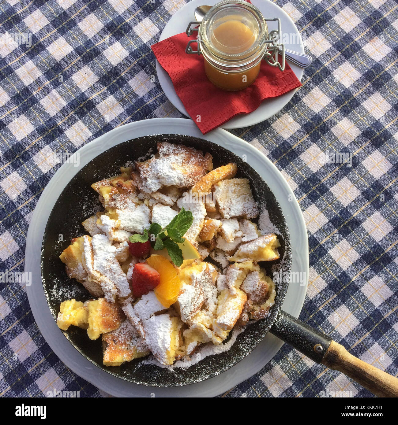 Famous Austrian dish Kaiserschmarrn served in a pan Stock Photo - Alamy