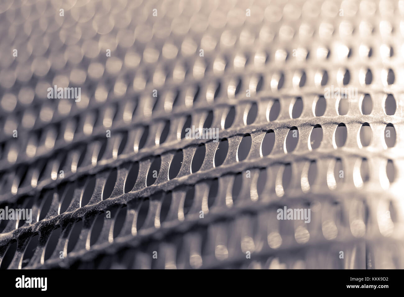 Aluminium perforated metal mesh background Stock Photo - Alamy
