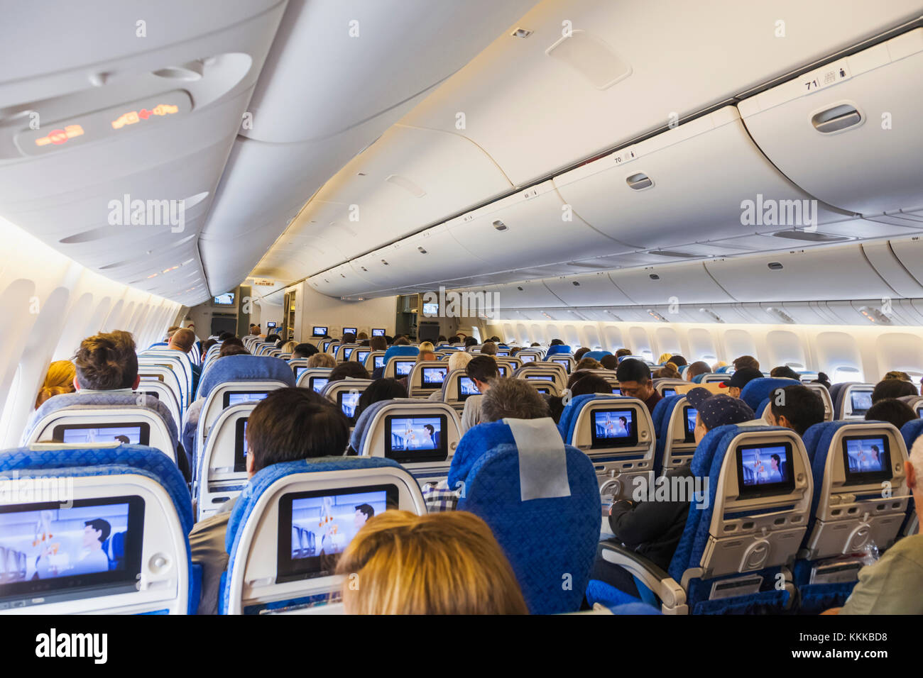 Aeroplane Inflight Cabin and Passengers Stock Photo - Alamy