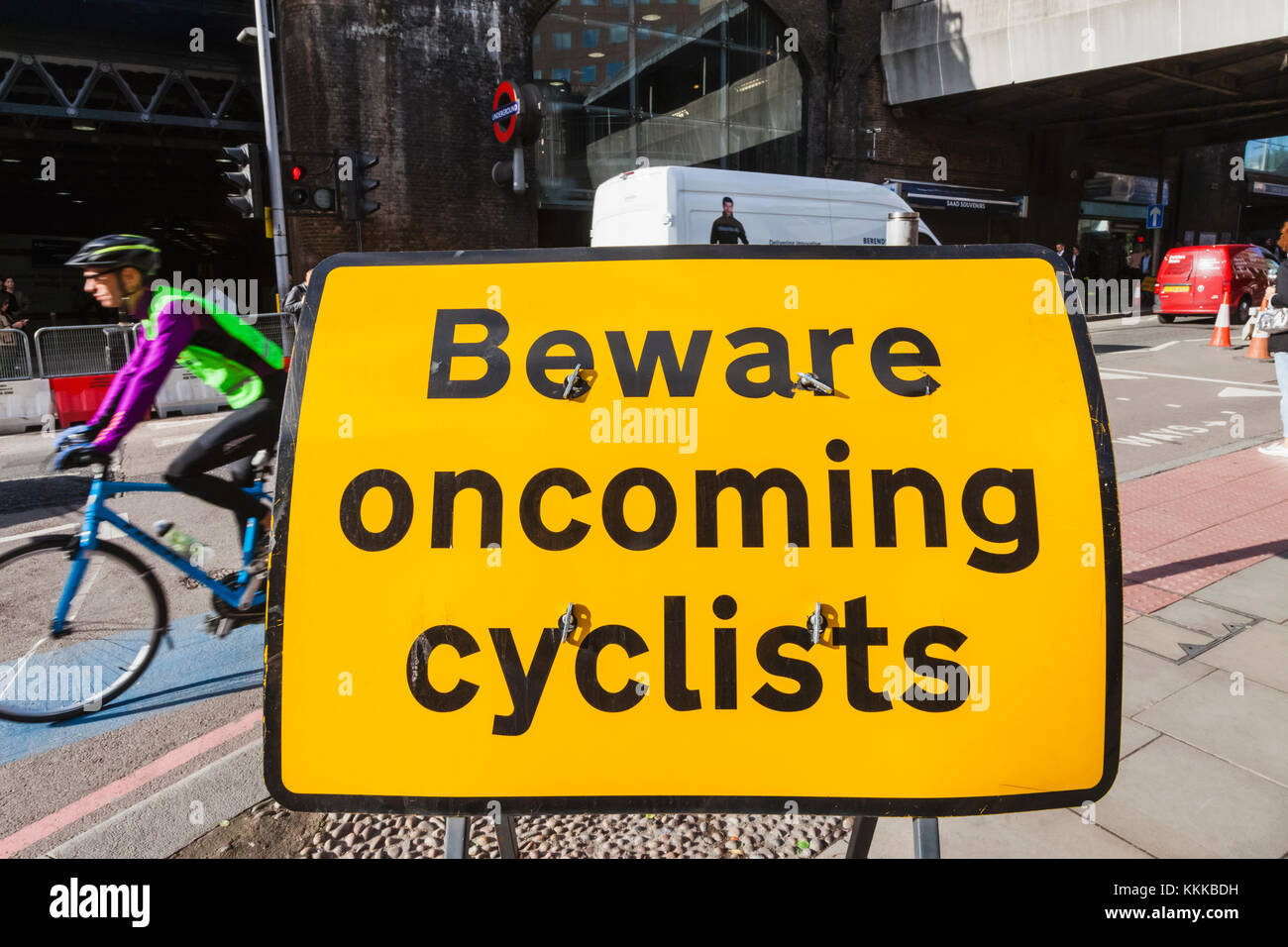 England, London, Beware Oncoming Cyclists Warning Sign Stock Photo - Alamy