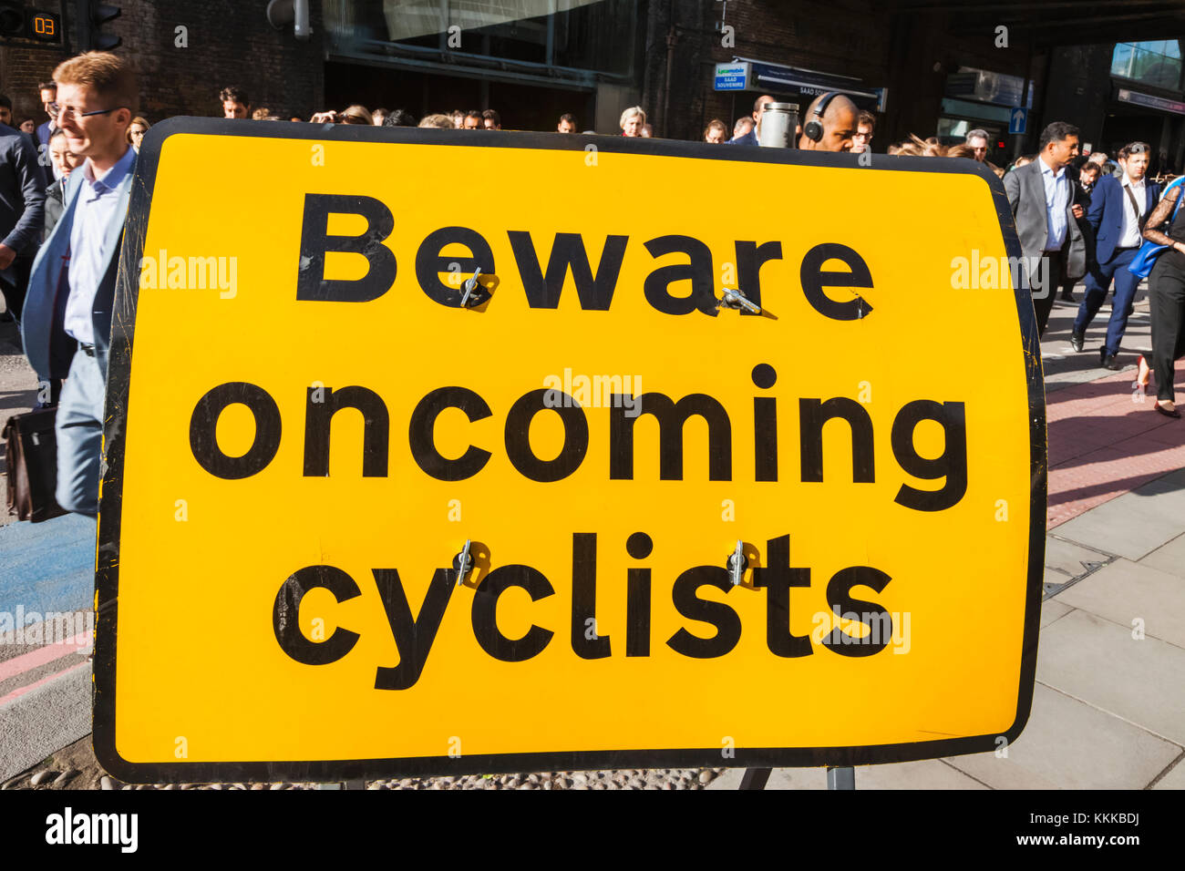 England, London, Beware Oncoming Cyclists Warning Sign Stock Photo - Alamy