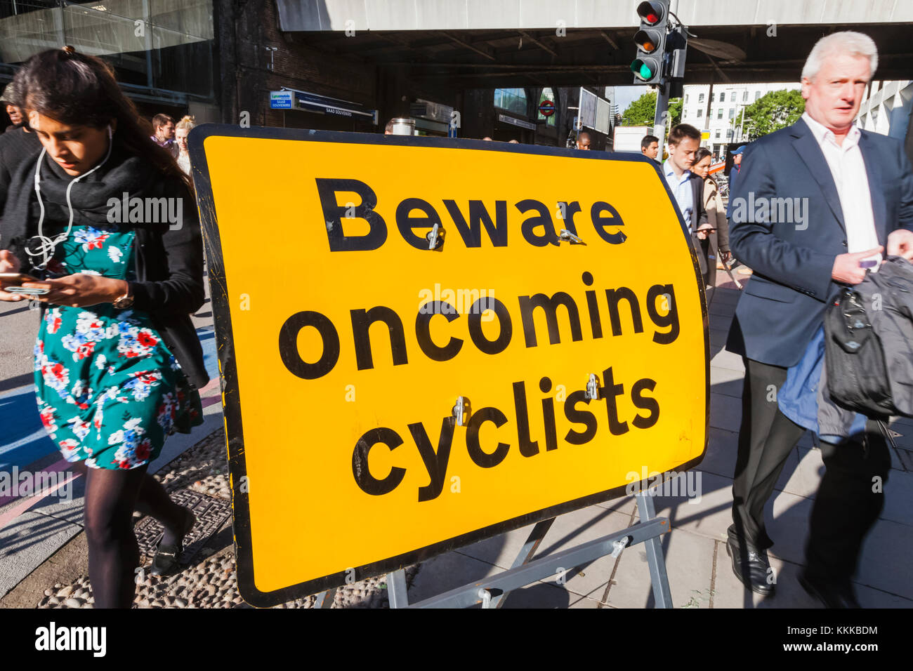 England, London, Beware Oncoming Cyclists Warning Sign Stock Photo - Alamy