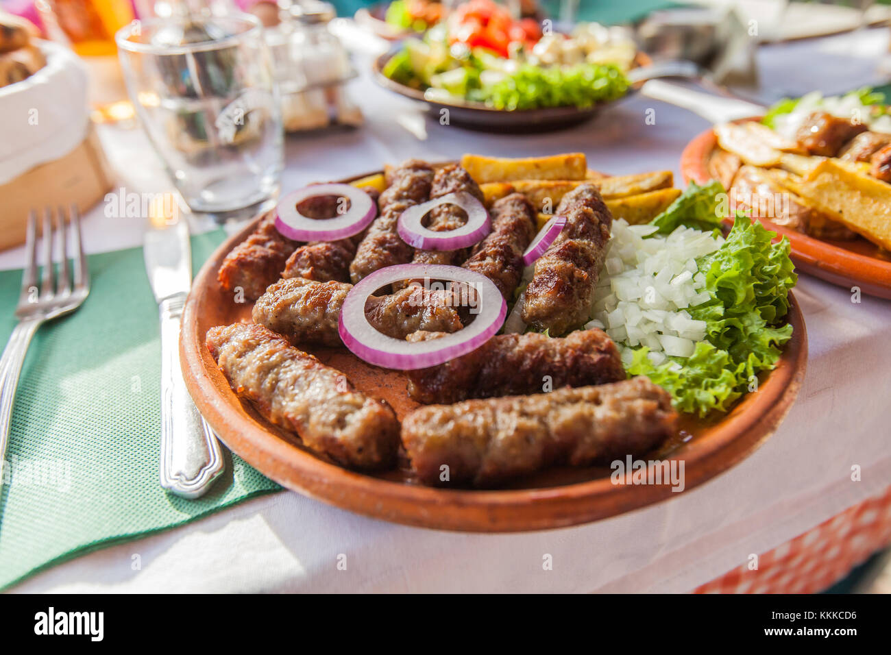 Grilled dish of minced meat on plate in restaurant traditional food of ...