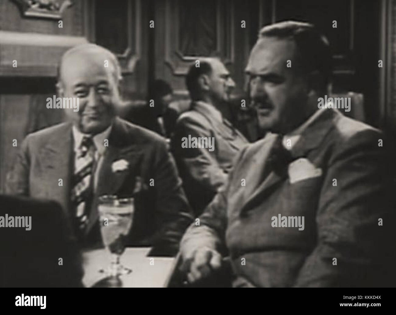 This image features Walter Walker and William B. Davidson in a scene from the trailer for ...