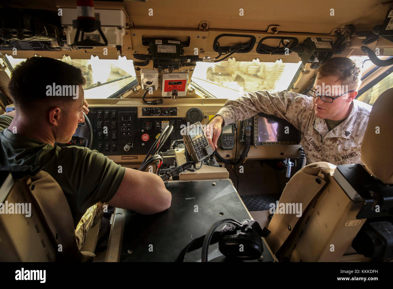 U.S. 5TH FLEET AREA OF OPERATIONS – Sgt. Michael Loboba, right, company ...