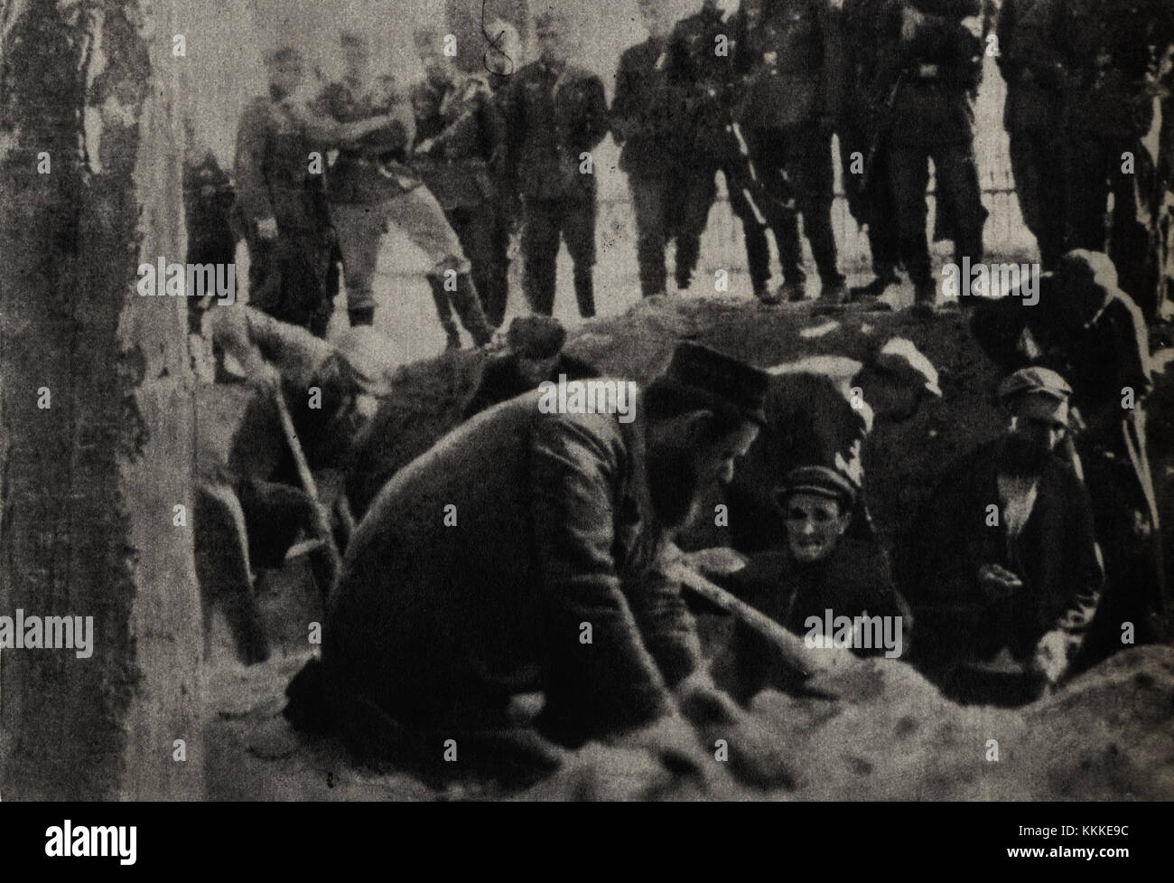 A historical photograph depicting the execution of Jews during World ...