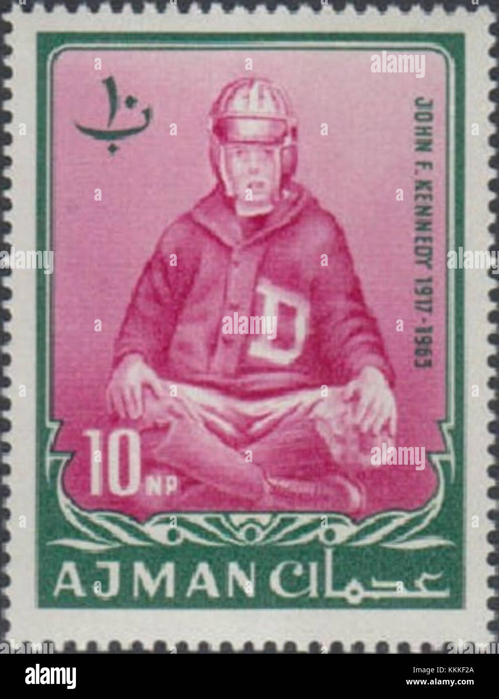 1964 stamp of Ajman JFK 1a Stock Photo - Alamy