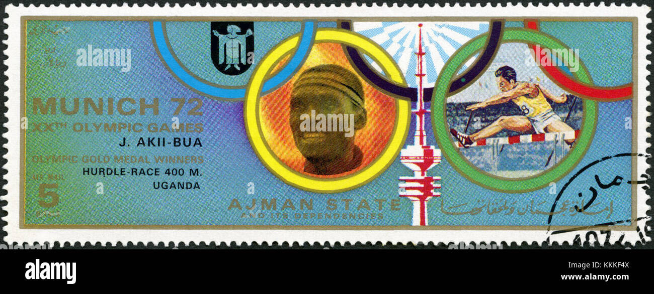 A stamp issued by Ajman circa 1972 featuring John Akii-Bua, Uganda's ...