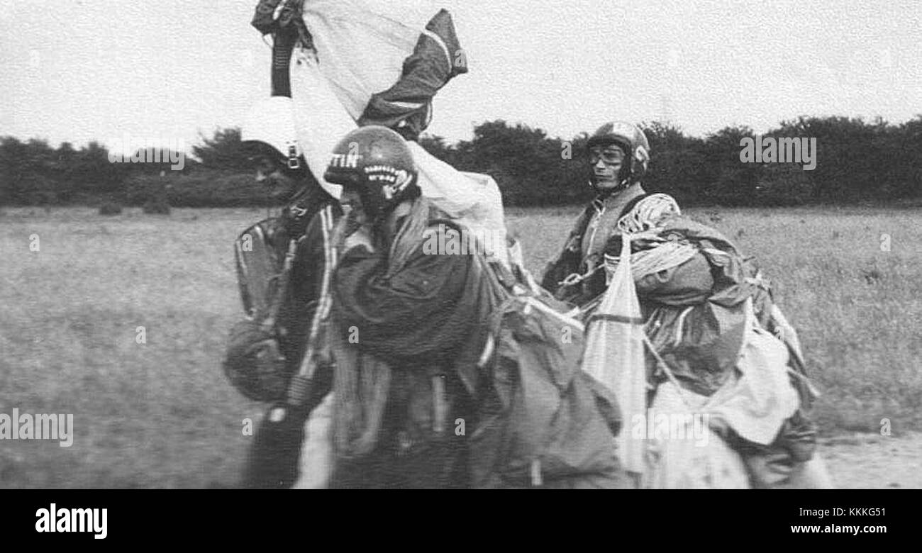 This photograph from 1983 captures parachutists after a jump ...