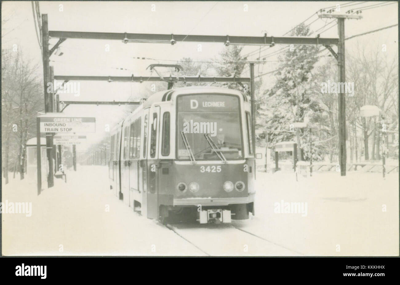 This 1984 postcard features the MBTA train number 3425 at Eliot Station ...