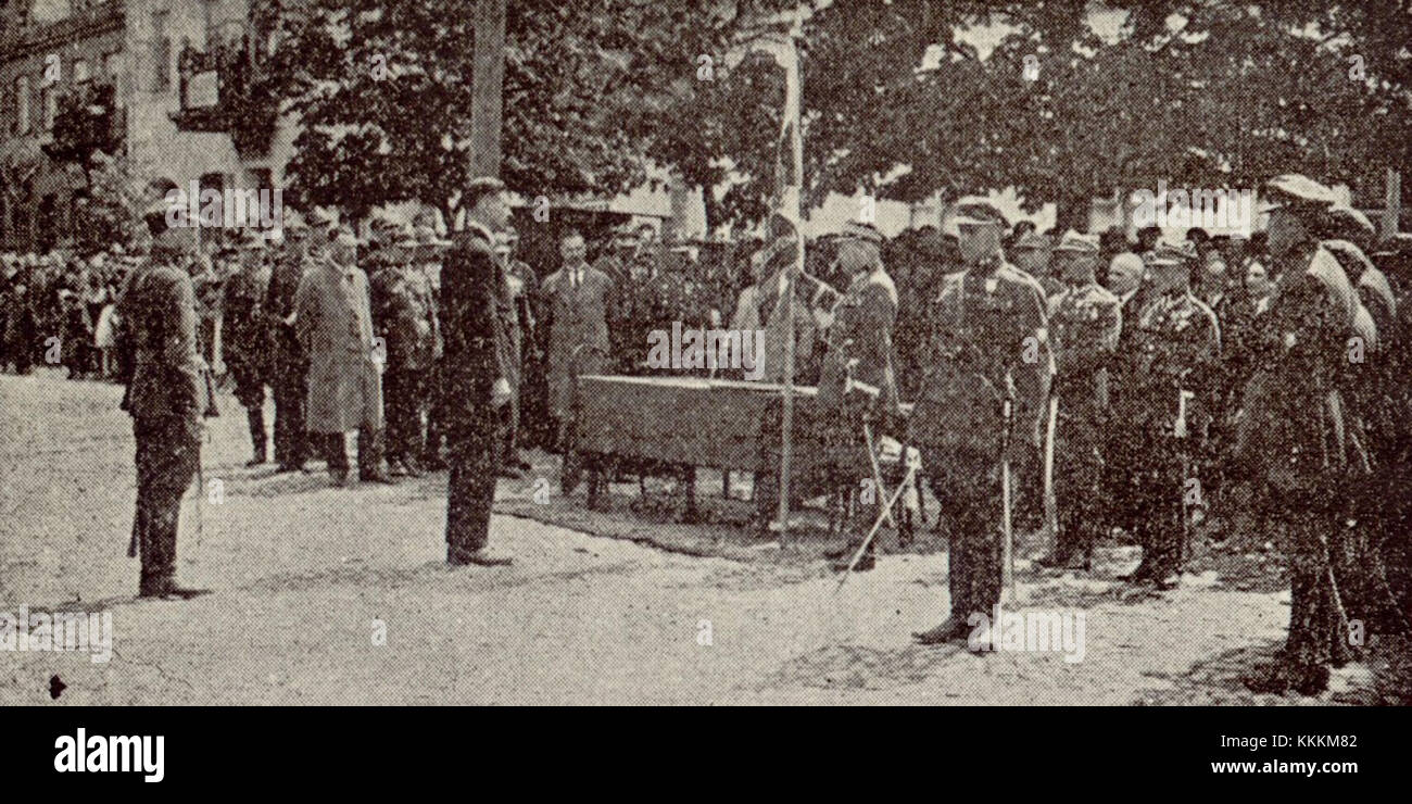 This photograph shows the presentation of the flag by General ...