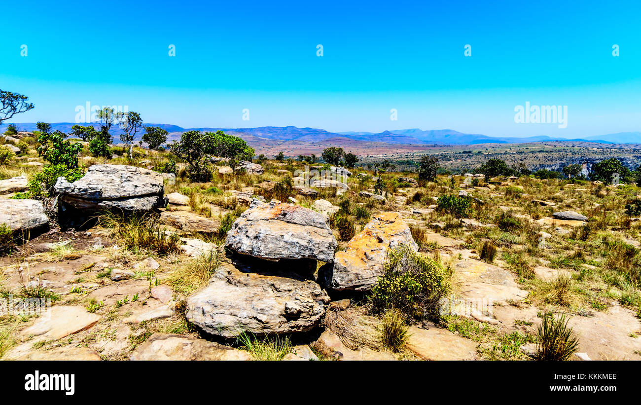 Rocks strewn on the Highveld plateau at the Blyde River Canyon along ...