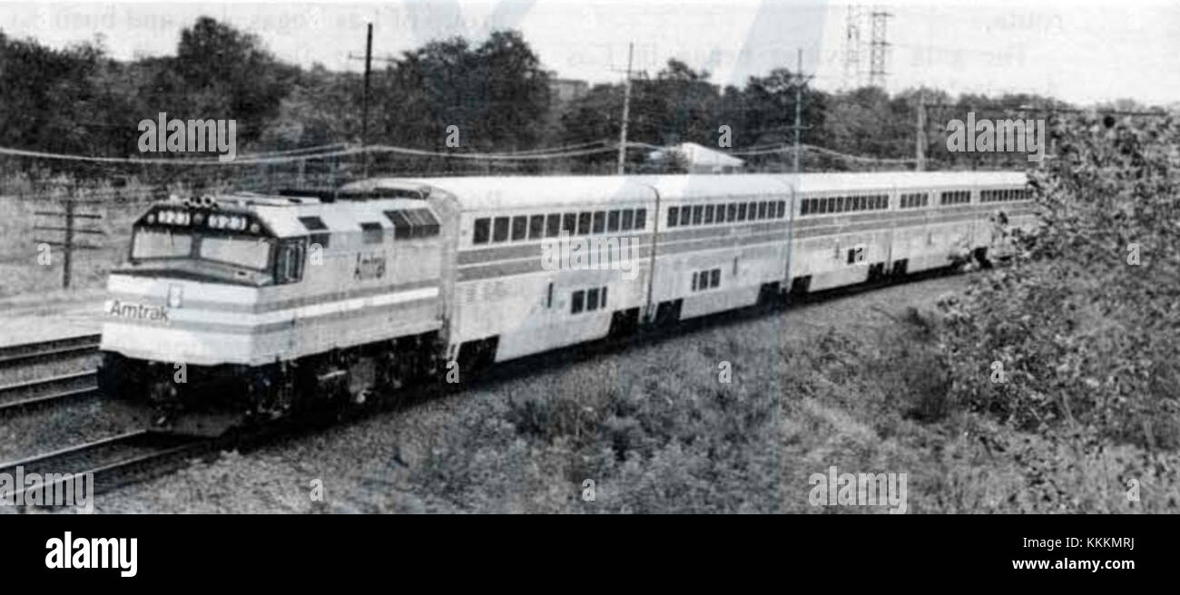 This image shows an Amtrak press train with Superliner cars at Lisle ...