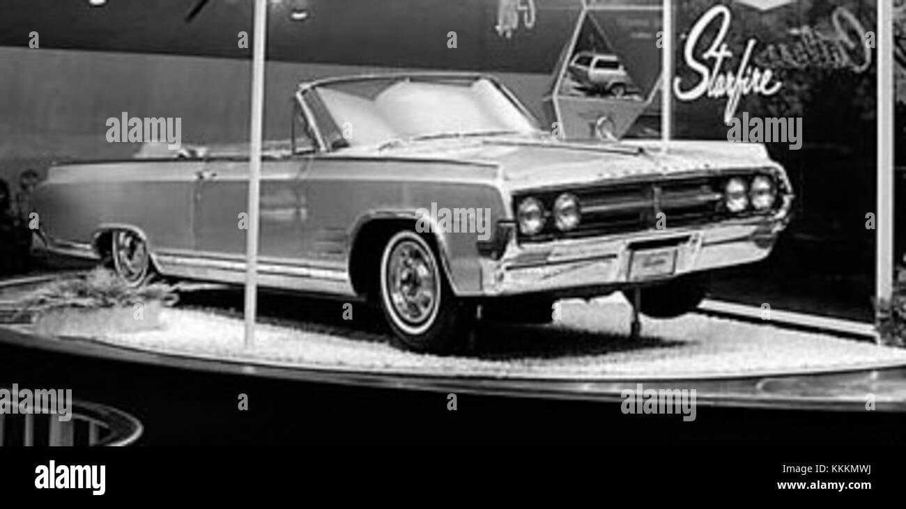 The 1964 Oldsmobile Starfire was a full-size luxury car, featuring a ...