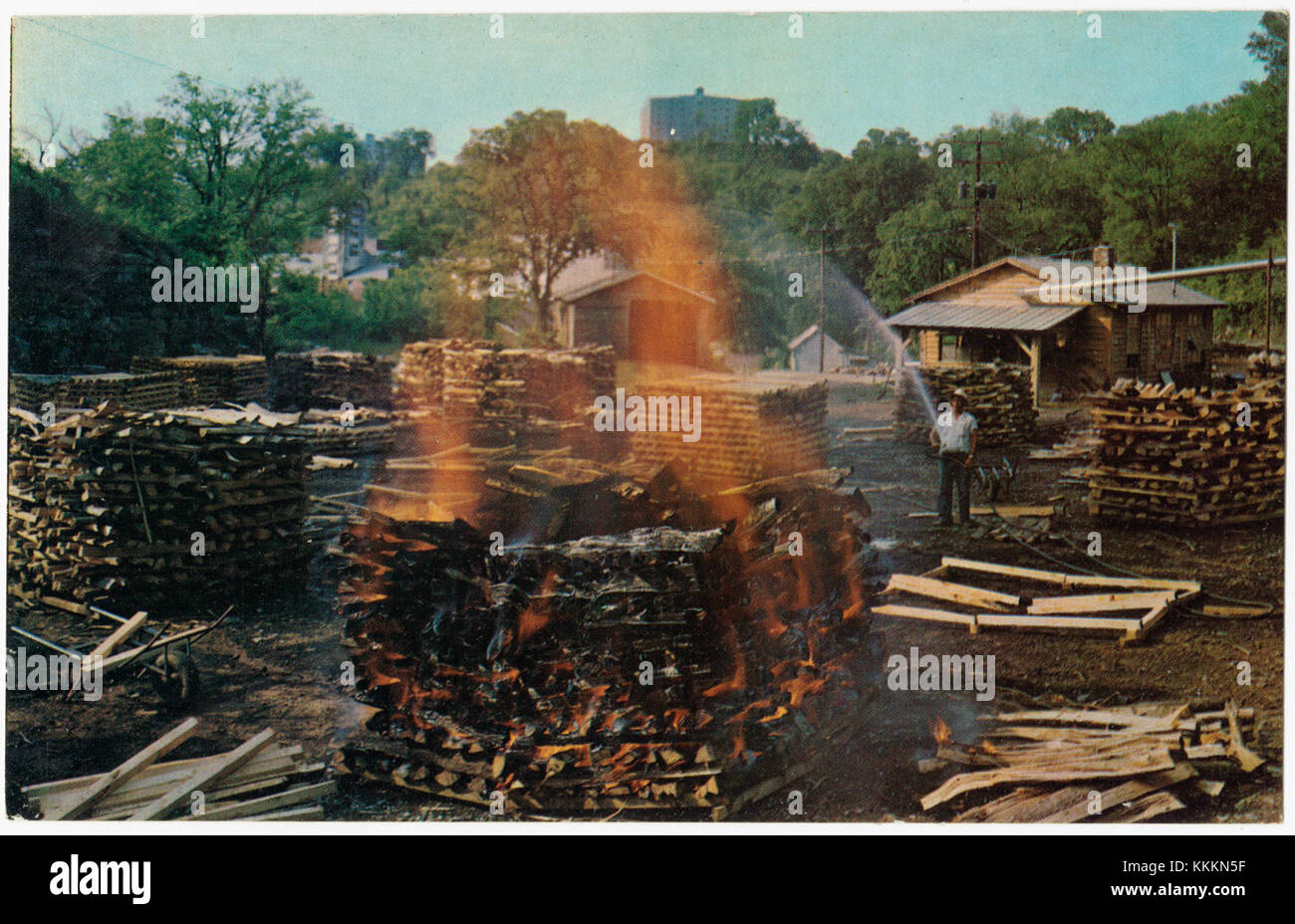 This image captures the traditional process of making charcoal at Jack ...