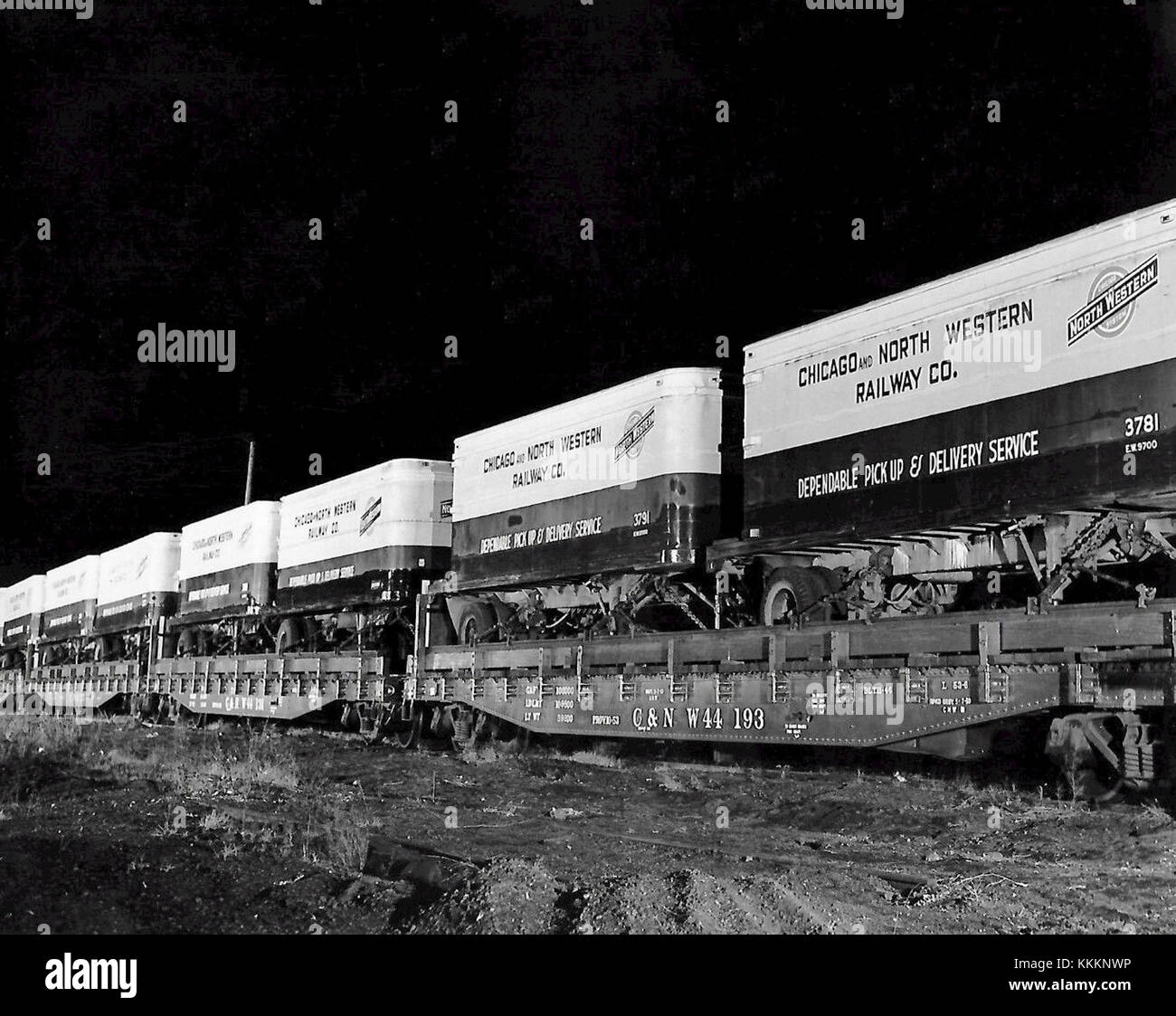 This image shows the Chicago and North Western piggyback freight cars ...