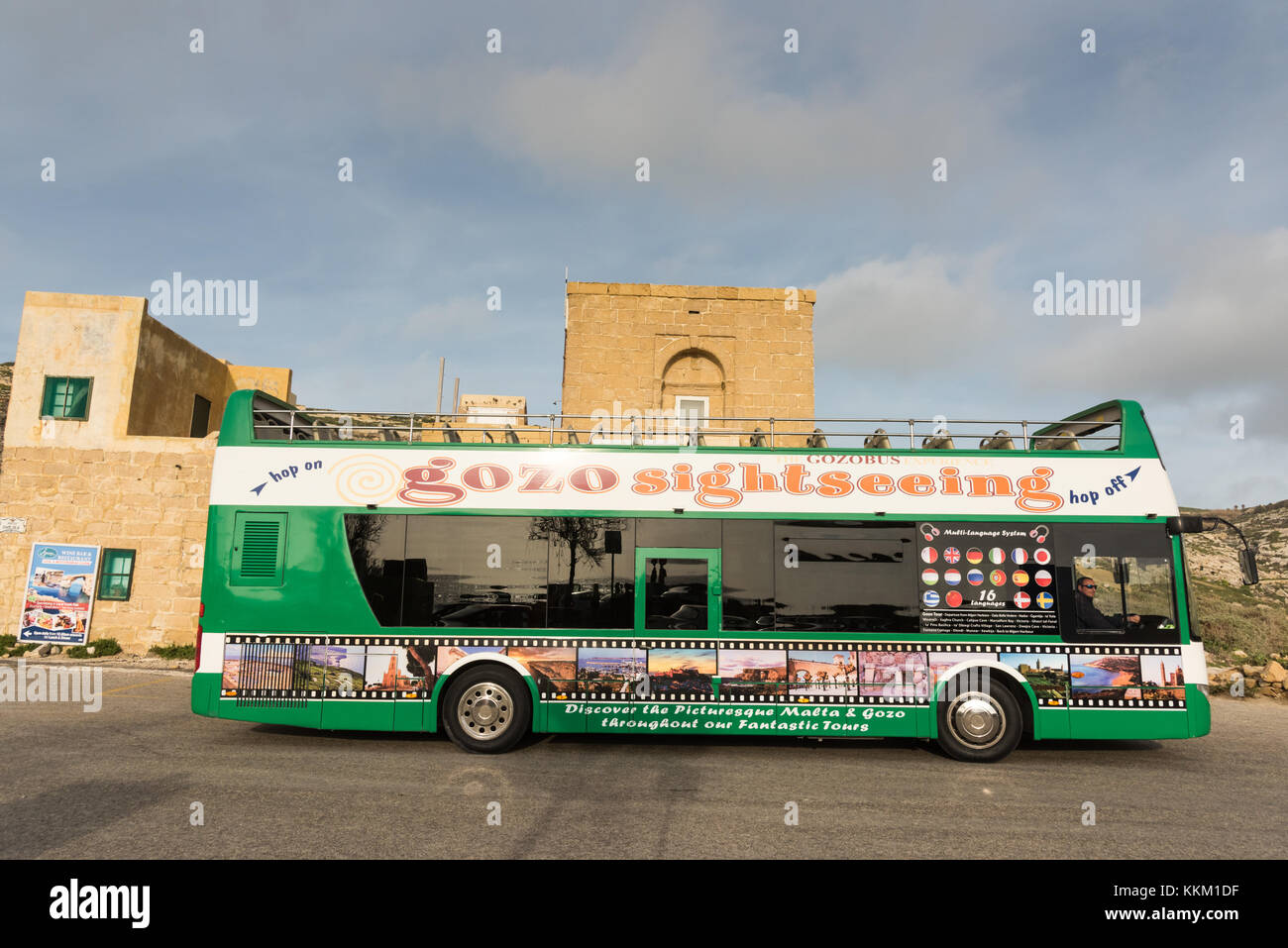 A tourist sightseeing trip bus or coach on the island of Gozo, Malta ...