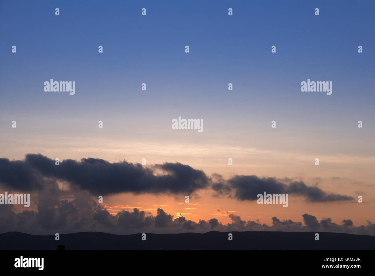 Colorful dawn/dusk sky with clouds background Stock Photo - Alamy